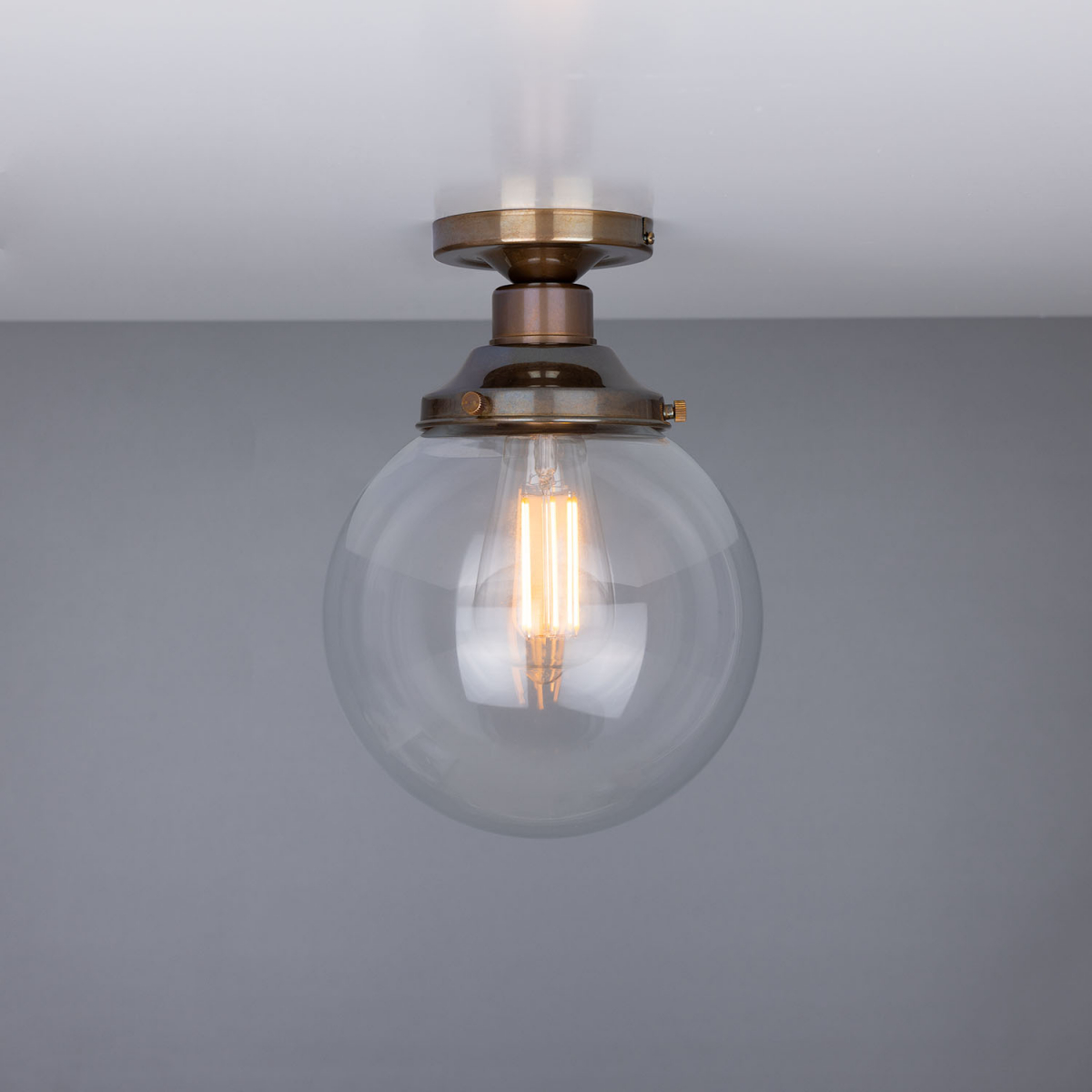 Riad Clear Glass Globe Flush Ceiling Light 20cm | Mullan Lighting