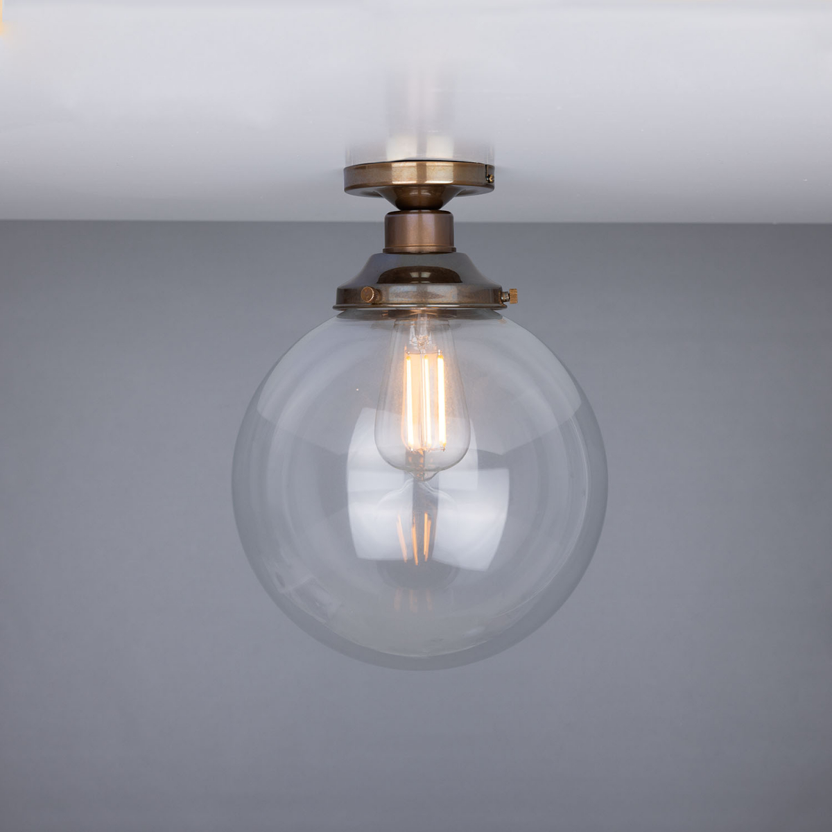 Riad Clear Glass Globe Flush Ceiling Light 25cm | Mullan Lighting