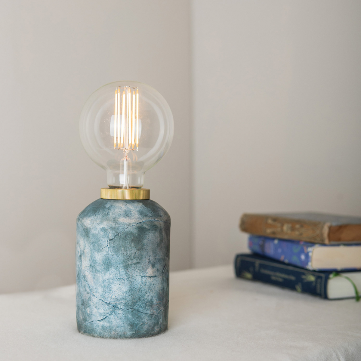 Bixa Small Ceramic Table Lamp, Blue Earth | Mullan Lighting