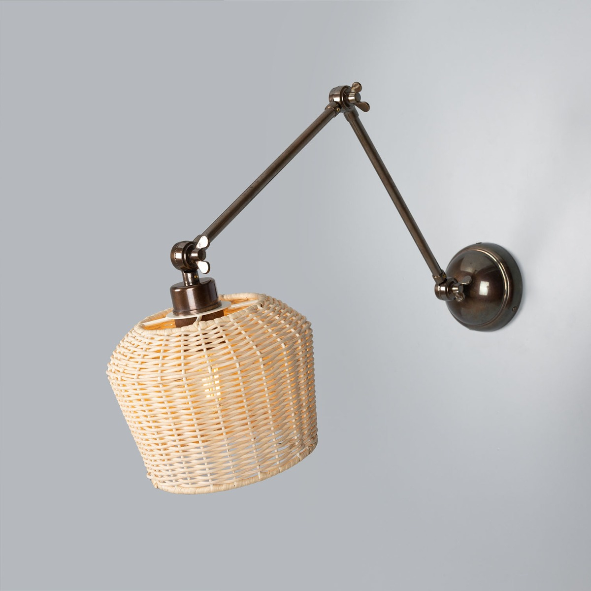Manila Adjustable Arm Wall Light with Small Rattan Shade | Mullan Lighting